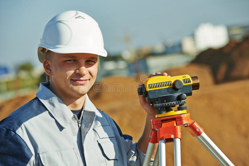 Surveyor worker with level stock image. Image of measure - 46318617
