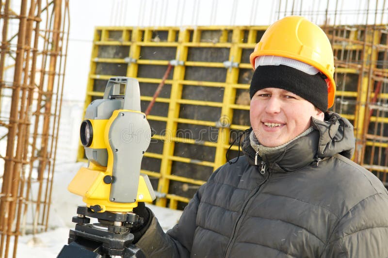 Surveyor worker with level stock image. Image of inspection - 46355121