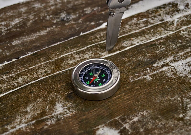 Survival Kit Compass and Knife in Wood Stock Image - Image of snow ...