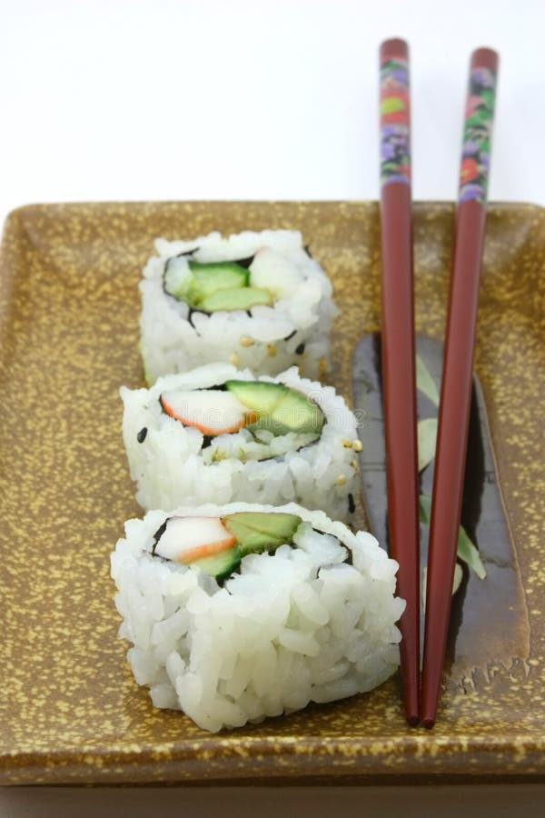 Sushi, 3 in a row on plate stock image. Image of chopped - 12285803