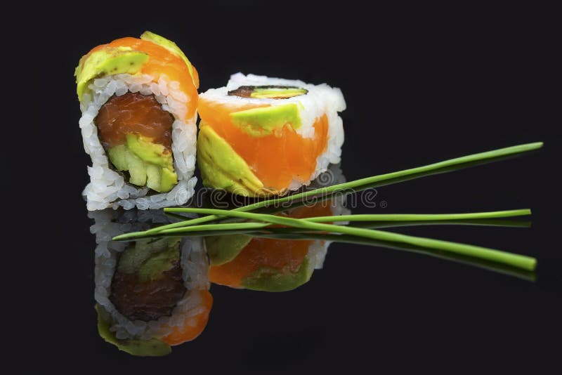 Sushi Arranged on a Shiny Black Surface Looking Delicious Stock Photo ...