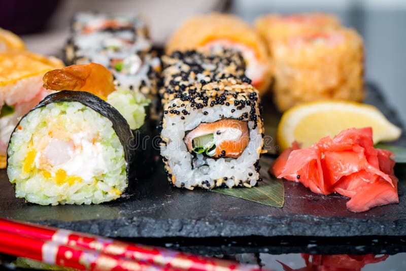 Sushi Assorted on the Table Stock Photo - Image of knife, chef: 61754930