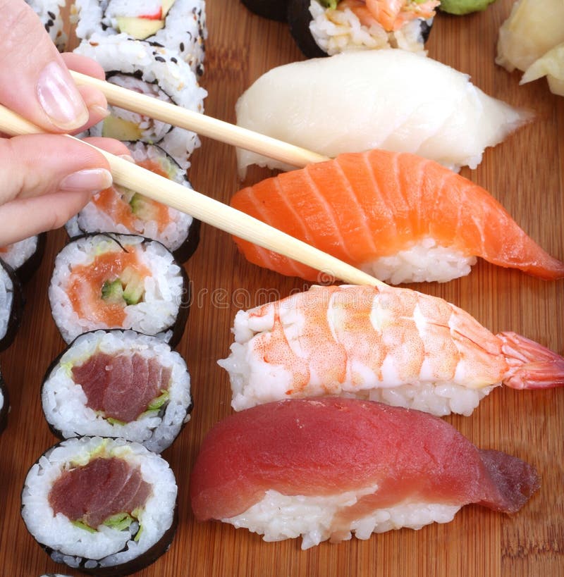 Sushi and Chopsticks on Plate Stock Image - Image of chopsticks, ginger ...