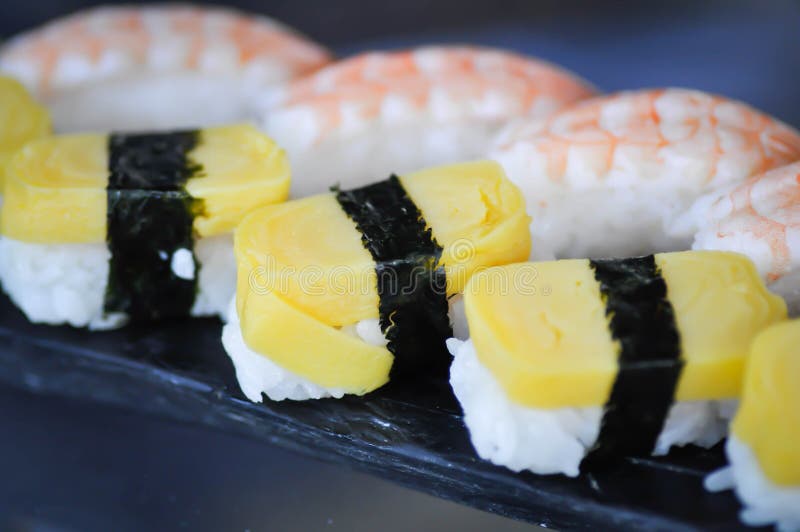 Sushi or Egg Sushi , Rice Topped with Egg and Shrimp Sushi or Steam Egg ...