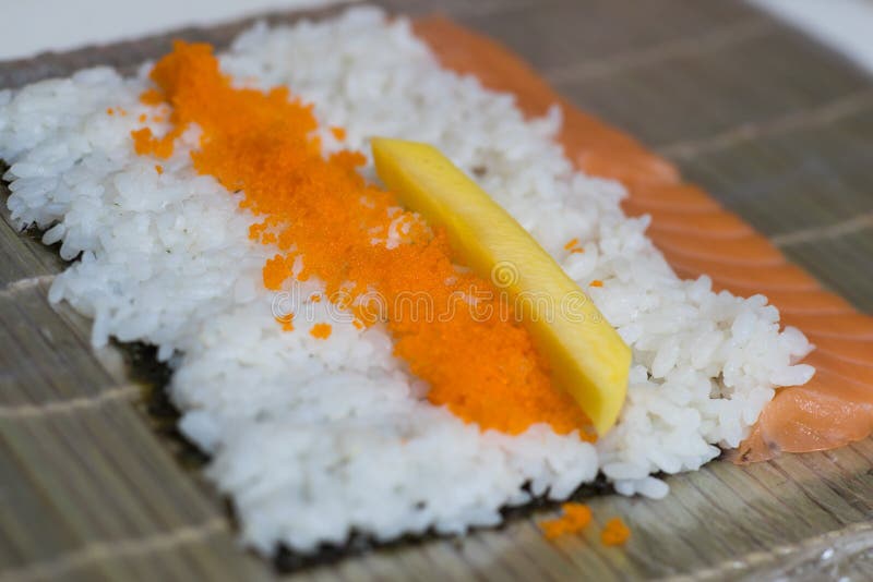 Sushi Master, Cutting Sushi Rolls. Making Sushi Rolls. Stock Photo ...