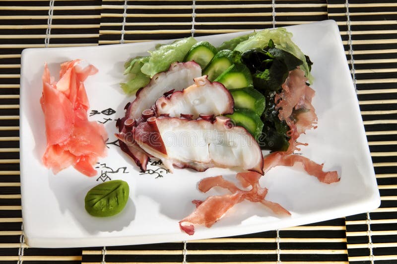 Sushi Menu Sliced Octopus, Cucumber and Seaweed Stock Image - Image of ...