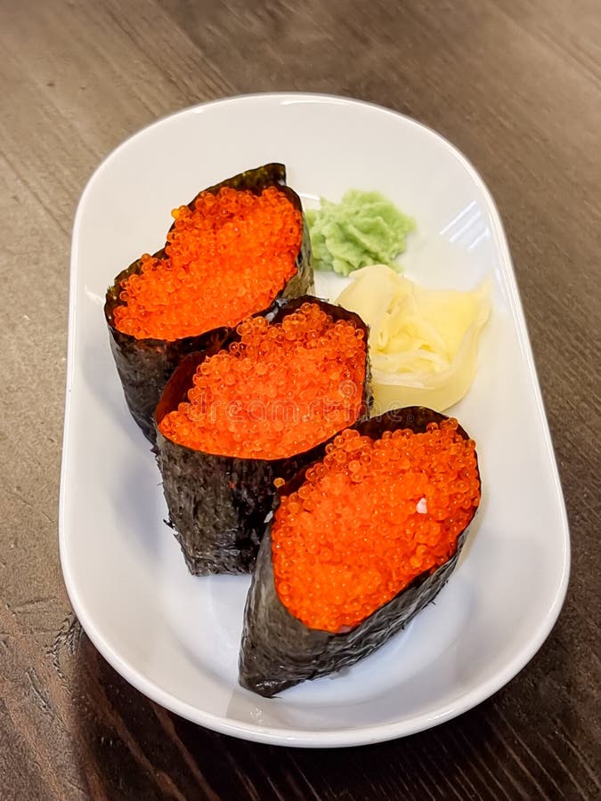 Sushi with Roe from Flying Fish Stock Photo - Image of table ...
