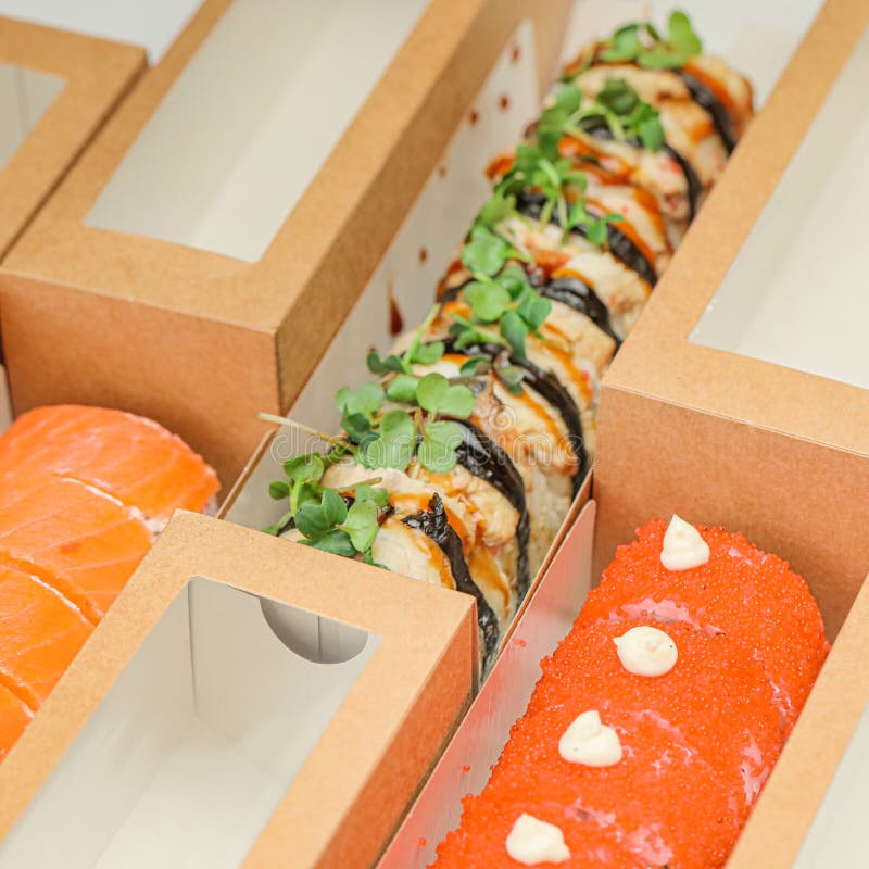 Sushi Roll in Box with Assorted Sushi Stock Photo - Image of fish, meal ...