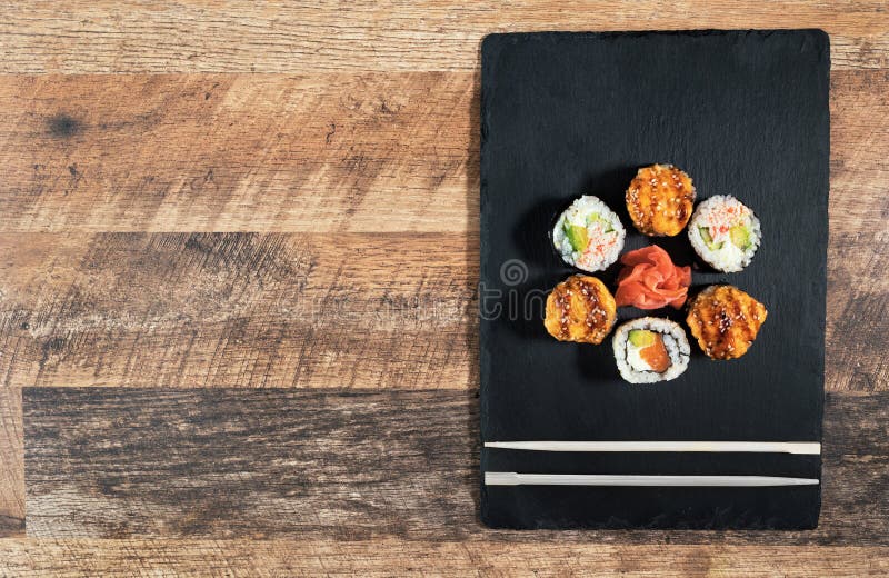 Sushi Roll Set on the Black Plate. Stock Image - Image of food ...