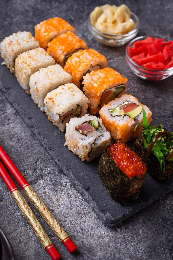Sushi and Roll Set on Black Table Stock Image - Image of japanese ...