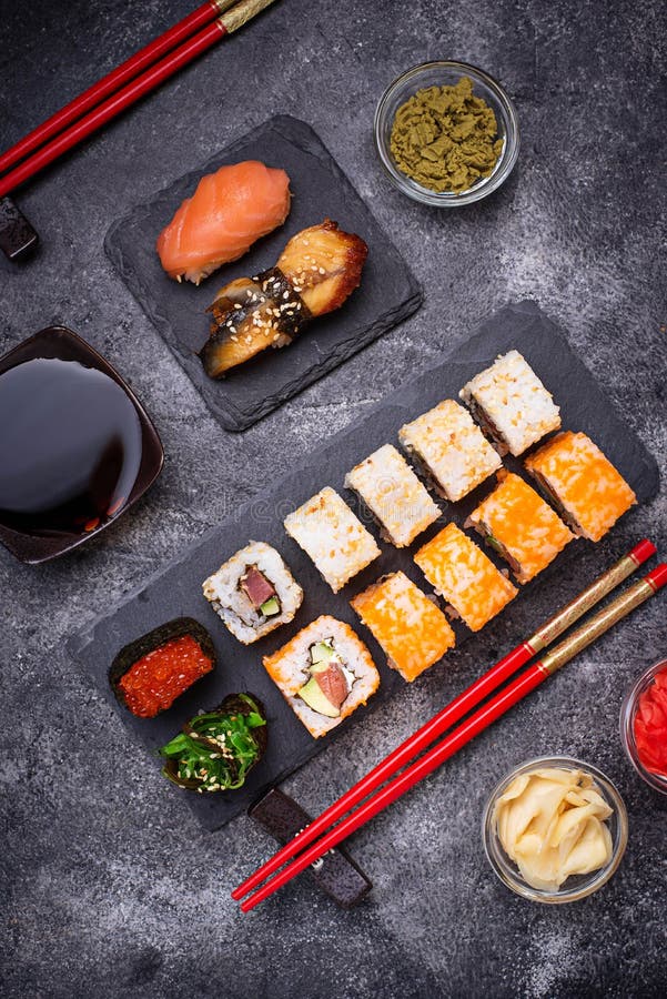 Sushi and Roll Set on Black Table Stock Photo - Image of assortment ...