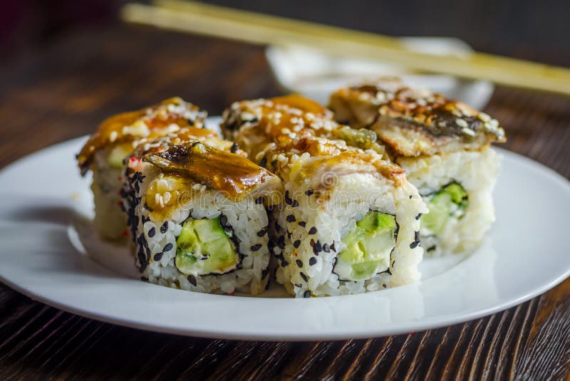 Sushi rolls with eel stock photo. Image of seafood, avocado - 134109898