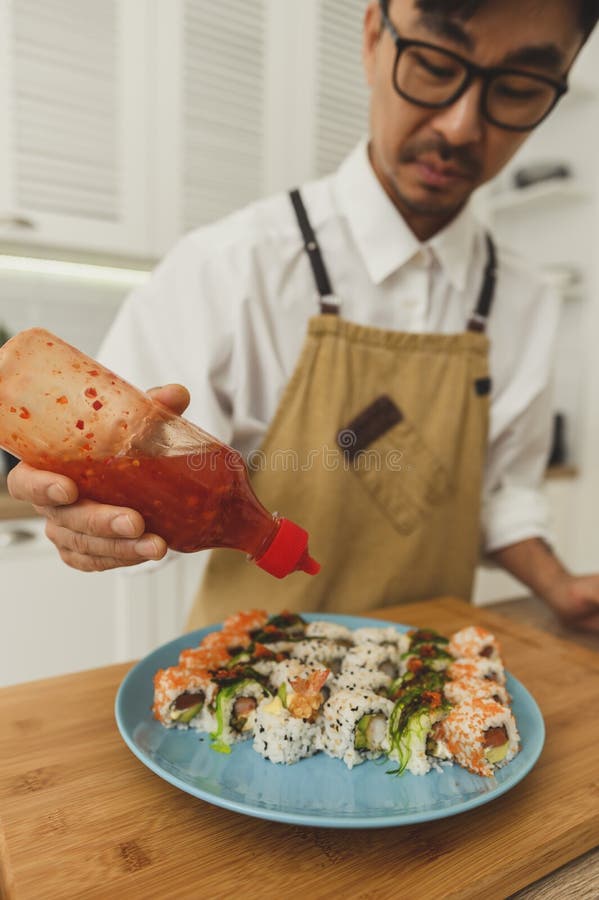 Sushi Rolls Making in Process, Close Up on Chef Hands Stock Photo ...