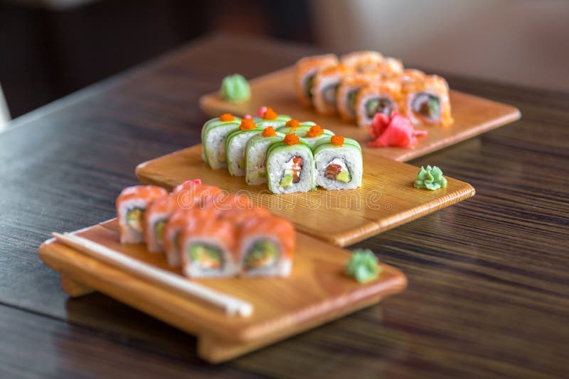 Sushi rolls on the table stock image. Image of cheese - 87877061