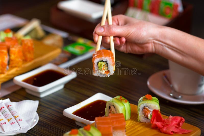 Sushi rolls on the table stock photo. Image of fresh - 87878478