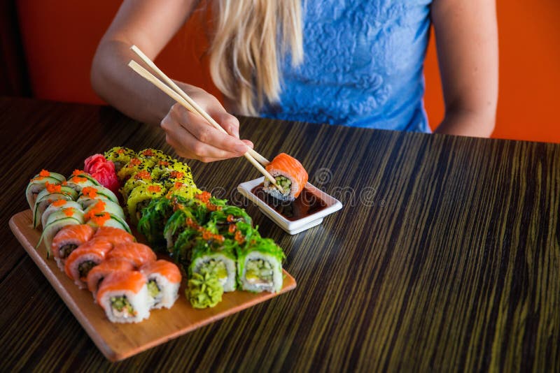 Sushi rolls on the table stock image. Image of rolls - 96690303