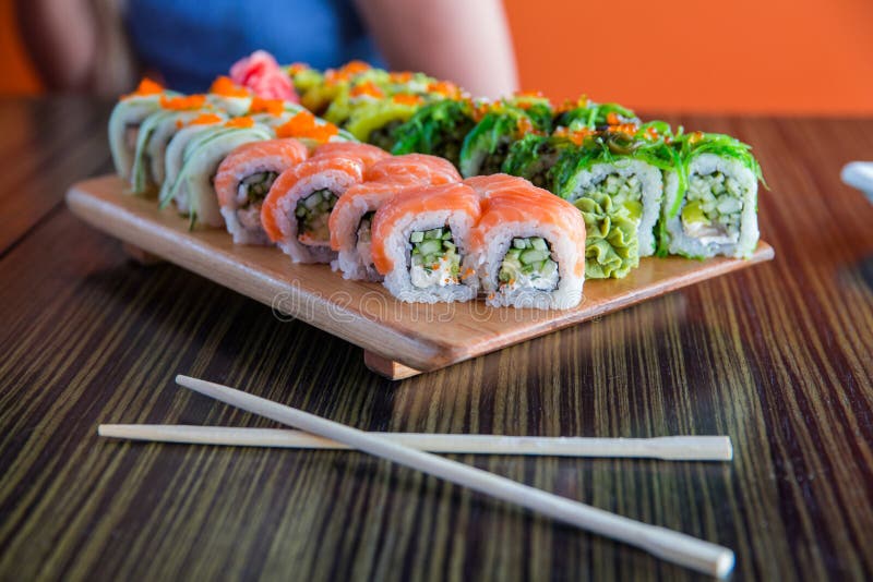 Sushi rolls on the table stock photo. Image of fresh - 96690582