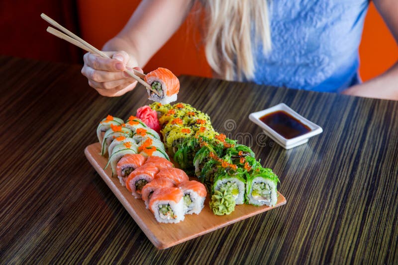 Sushi rolls on the table stock image. Image of healthy - 96690605