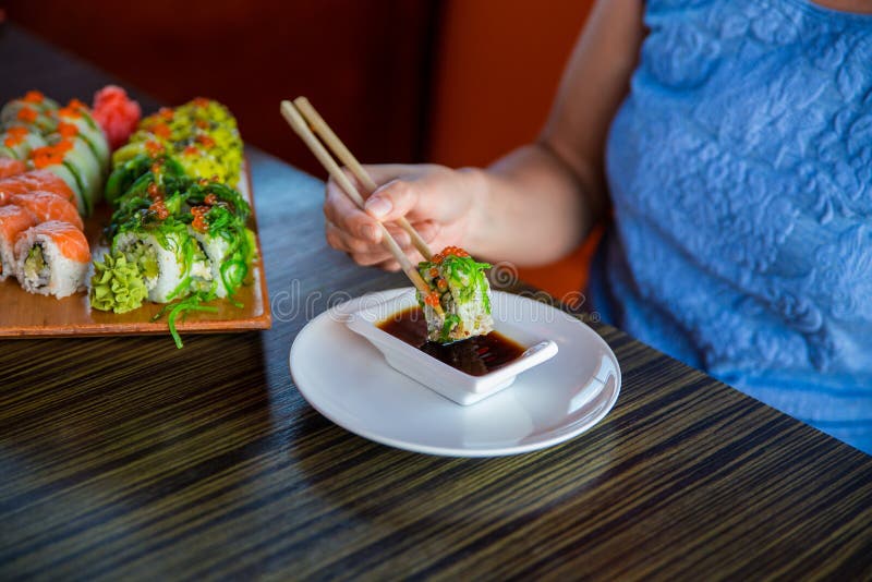 Sushi rolls on the table stock image. Image of cheese - 96690947