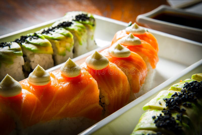 Sushi rolls table setting stock image. Image of dishes - 27756999
