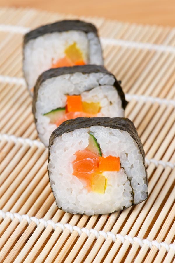 Sushi in a row stock image. Image of gourmet, seafood - 27692739