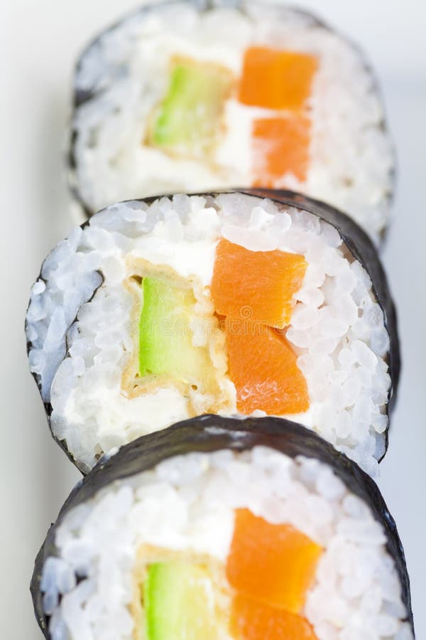 Sushi in Row on White Plate Stock Image - Image of roll, dining: 34419901