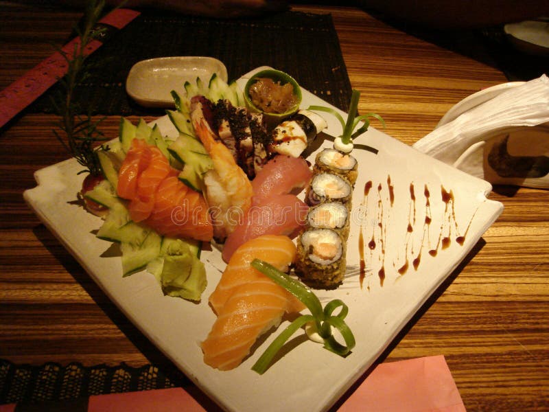 Sushi and Sashimi plate stock image. Image of napkins - 63125873