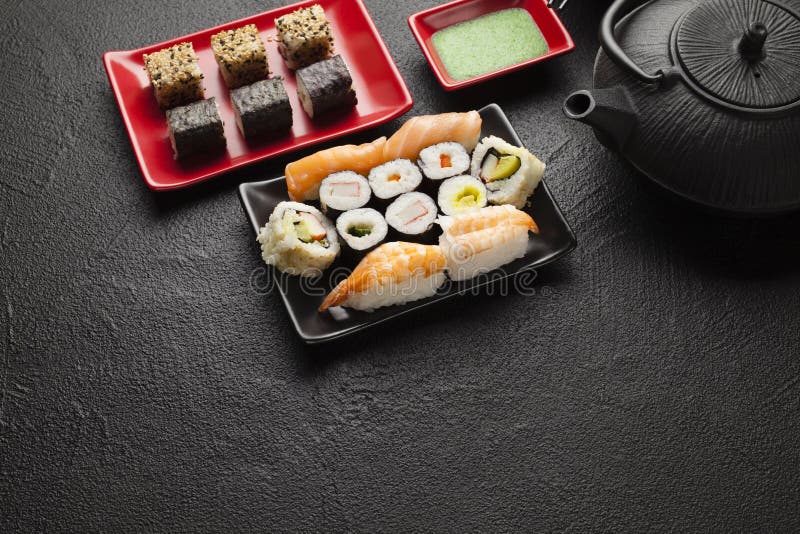 Sushi Set and Black Teapot on Black Table Stock Photo - Image of japan ...