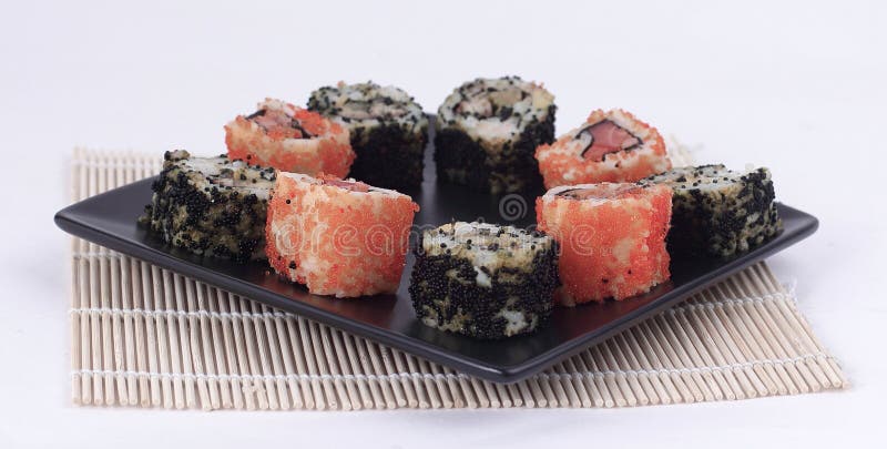 Sushi Set - Different Types of Maki Sushi and Chopsticks on a B Stock ...