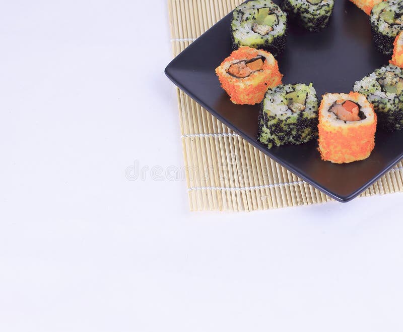 Sushi Set - Different Types of Maki Sushi and Chopsticks on a B Stock ...