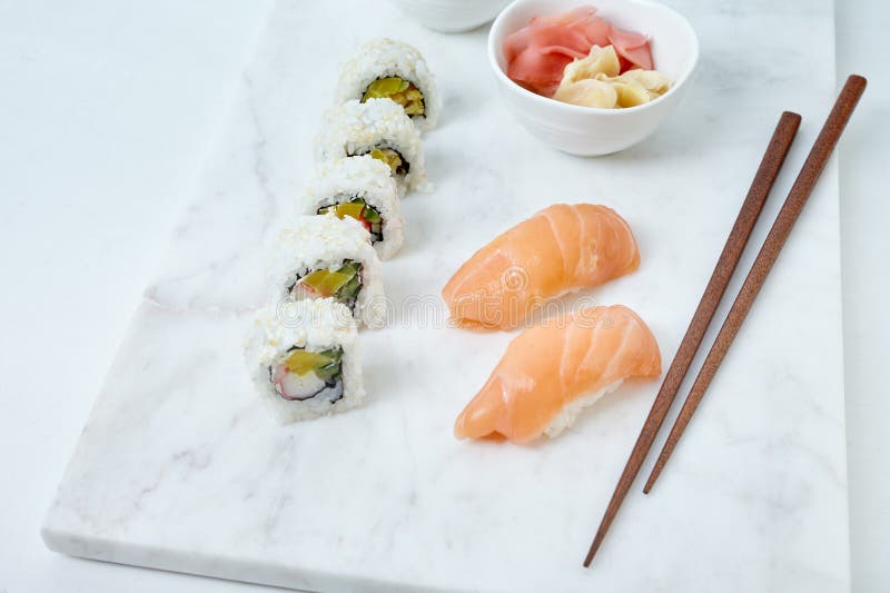 Sushi set on marble board stock photo. Image of healthy - 209932544