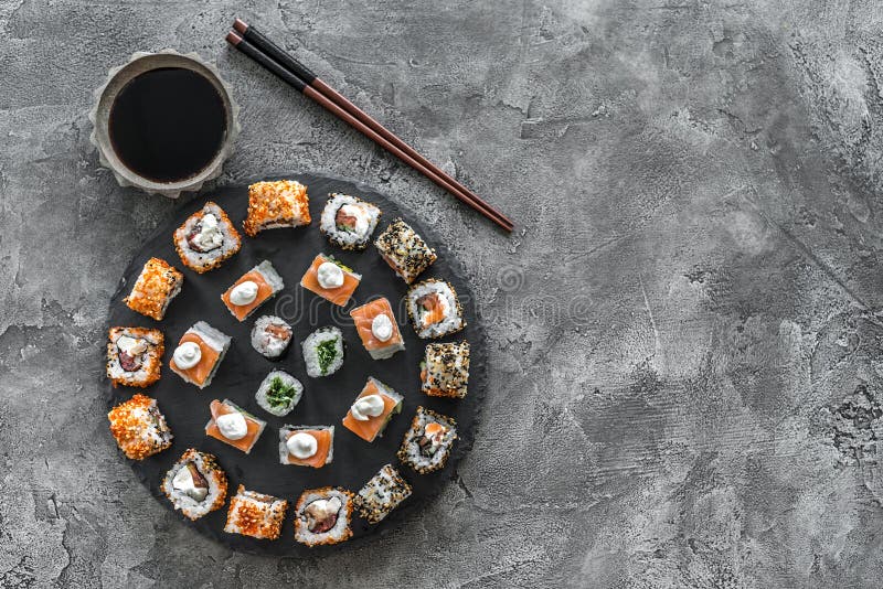 Sushi set on a round board stock image. Image of shrimp - 99280269