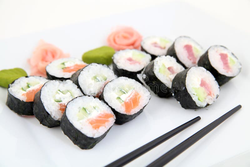Sushi Set on White Plate. Traditional Japanese Sushi Rolls Stock Photo ...