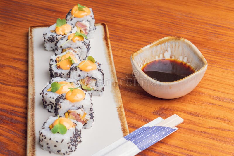 Sushi and Soy Roll on Wooden Table. Sushi Menu Stock Photo - Image of ...