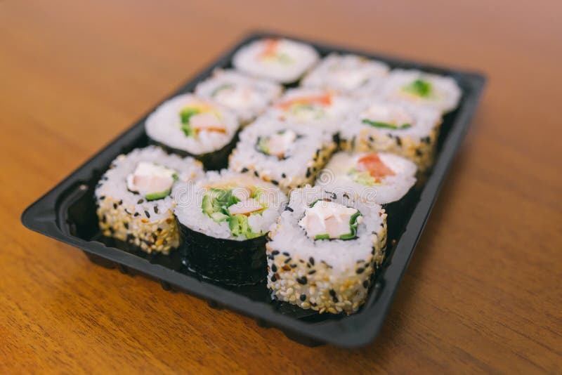 The Sushi On The Table In The Delivery Package Ordered In Sushi Roll Stock Image Image Of