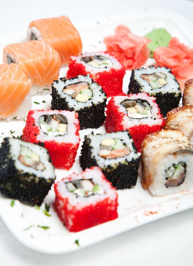 Sushi on the white plate stock photo. Image of salmon - 19206712