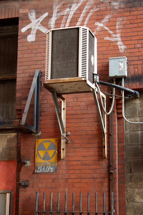 Suspended Air Conditioning Unit in a City Alley Stock Image - Image of ...