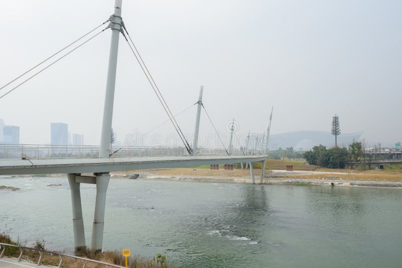 Suspended Beam Bridge Over River in Light Winter Mist Stock Image ...