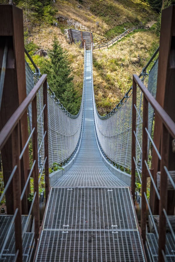 Suspended bridge on alps stock photo. Image of tirol - 130959904