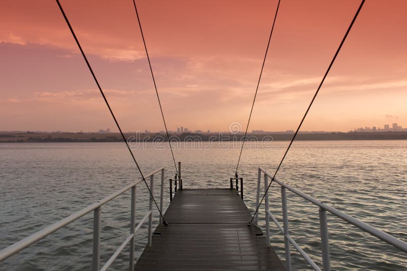 Suspended Bridge Ship Dock and Sunset Stock Photo - Image of deck ...