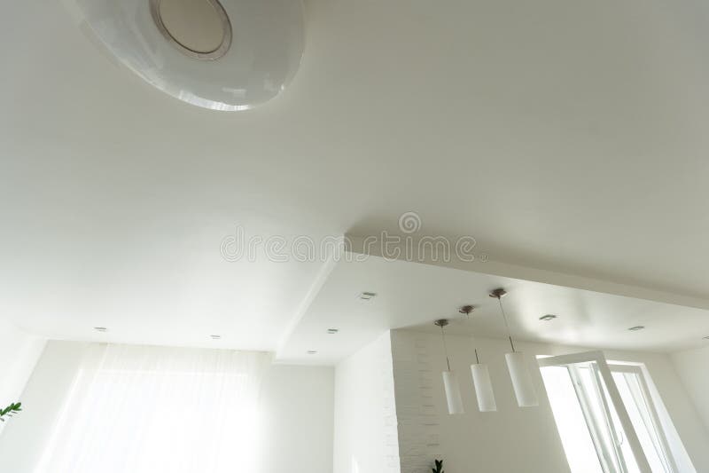 Suspended Ceiling with Halogen Spots Lamps and Drywall Construction in ... Suspended Ceiling with Halogen Spots Lamps and Drywall Construction in ...