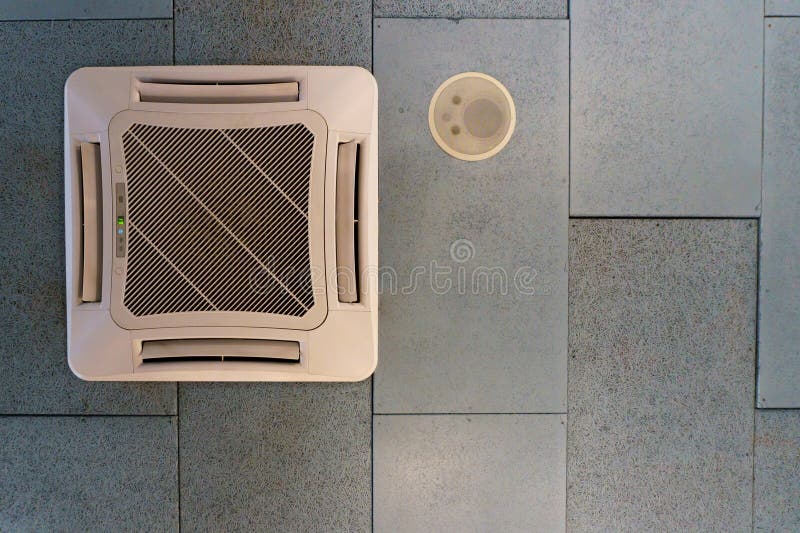 Suspended Ceiling with Ventilation Holes. Air Conditioning Built into ...