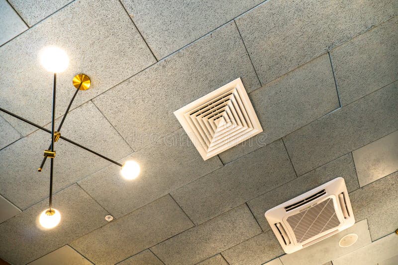 Suspended Ceiling with Ventilation Holes and Lamps. Interior Design in ...