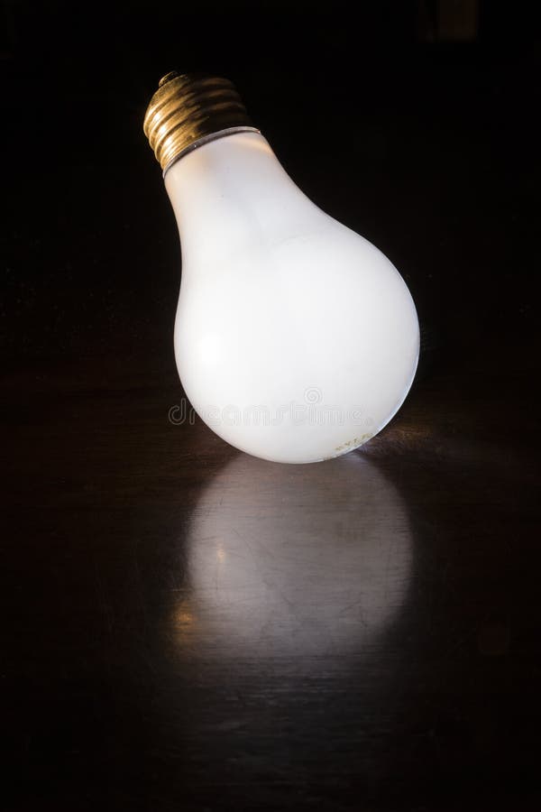Floating Lit Lightbulb Above Human Head Stock Photo - Image of ...