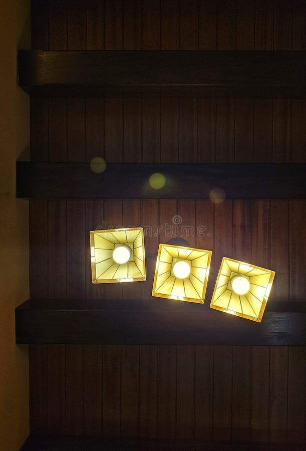 Suspended Lighting Fixtures Stock Photo - Image of square, shape: 394336214