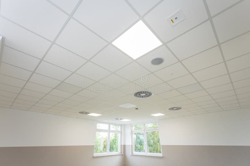 A Suspended Panel Ceiling Seen in Perspective in a Narrow Room. Stock ...