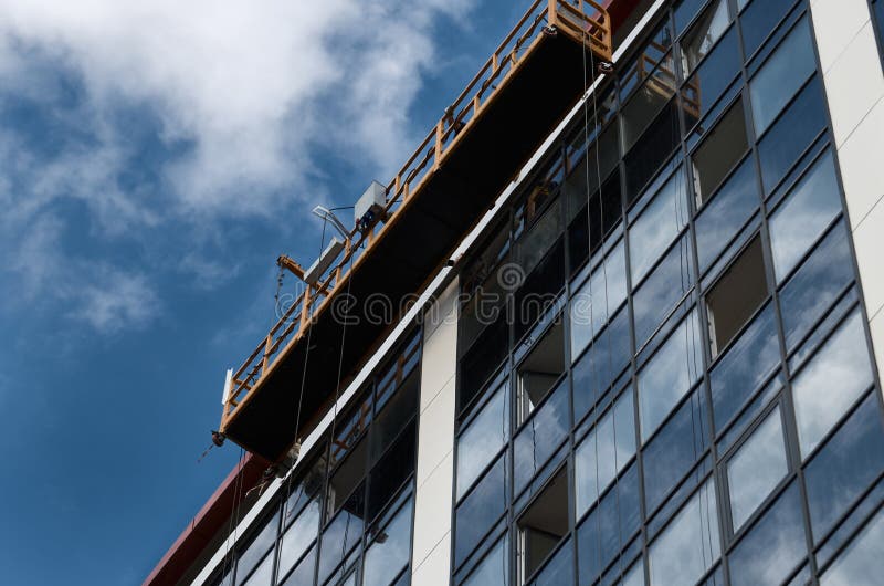 Suspended Platform without Workers on a Glass and Steel Facade of ...