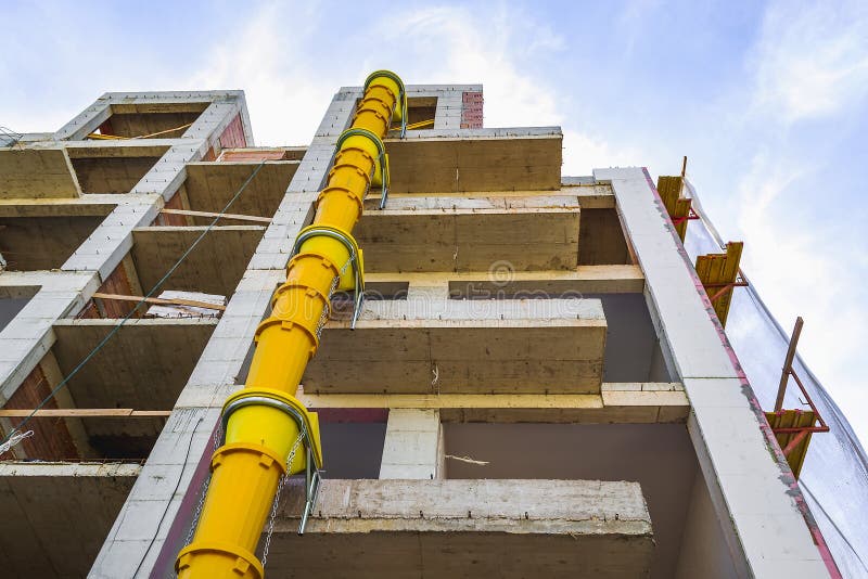 Yellow Construction Waste Chute Stock Image - Image of concrete ...