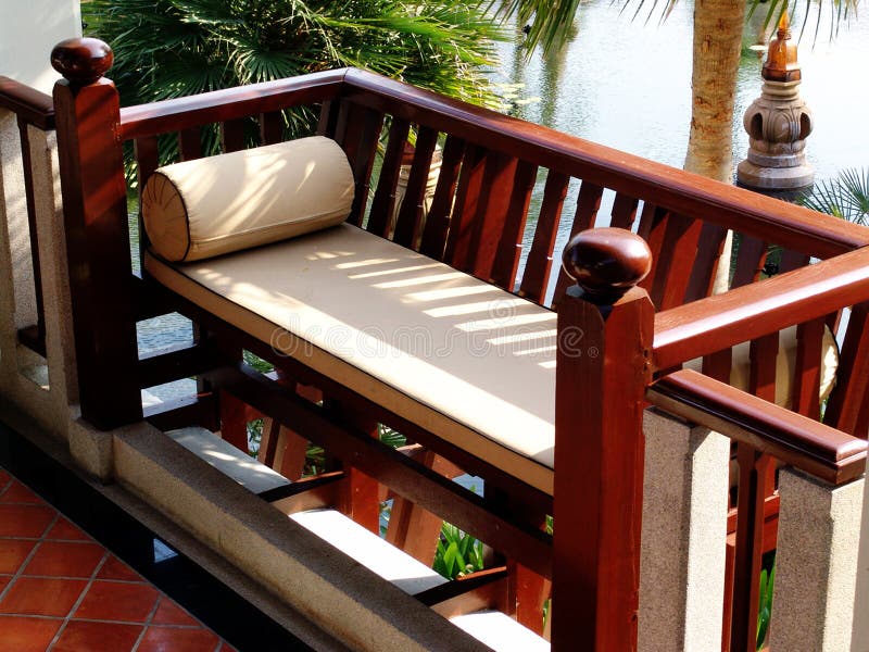 Suspended Wooden Bench with Pillow Stock Photo - Image of vacation ...