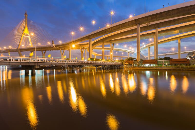 Suspension Bridge and Highway Curved Riverside Stock Image - Image of ...